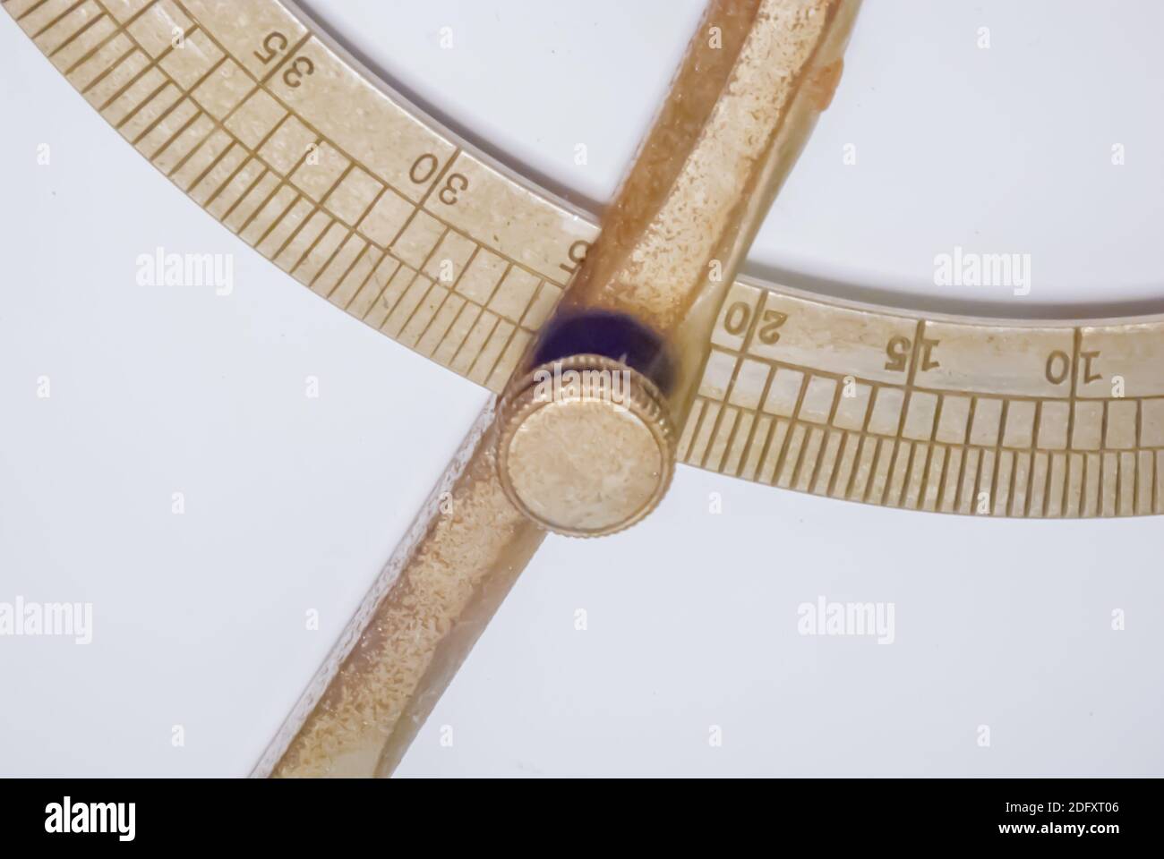 A closeup of a vintage rusty dividing compass isolated on white ...