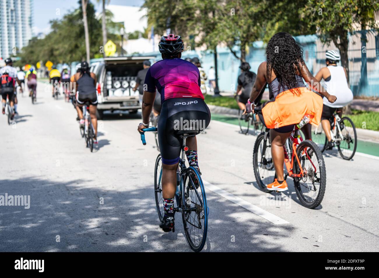 Street photography group bike ride Miami Beach Sunday Morning Stock ...