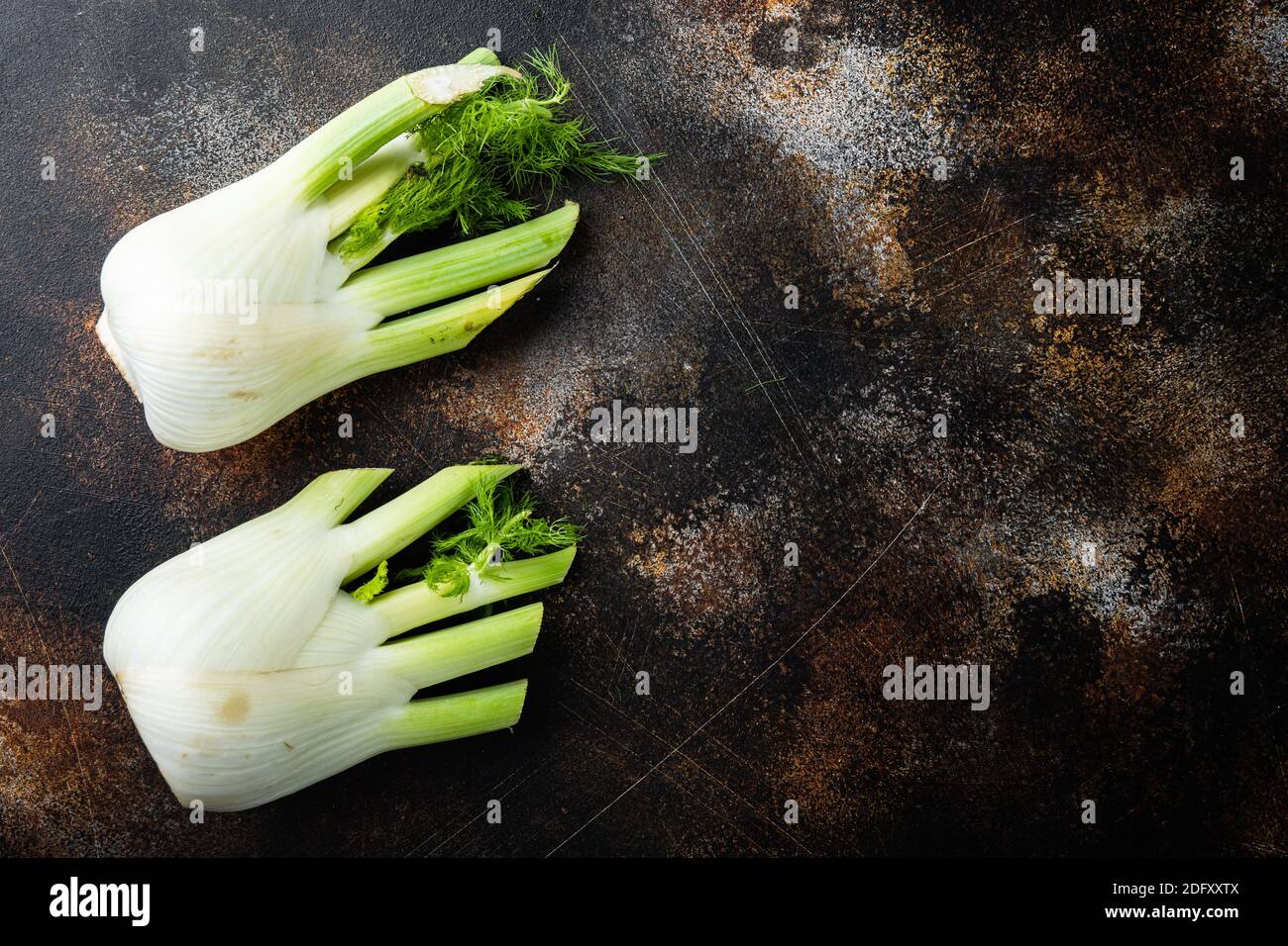 Fennel bulbs, on old rustic background, top view with space for text ...