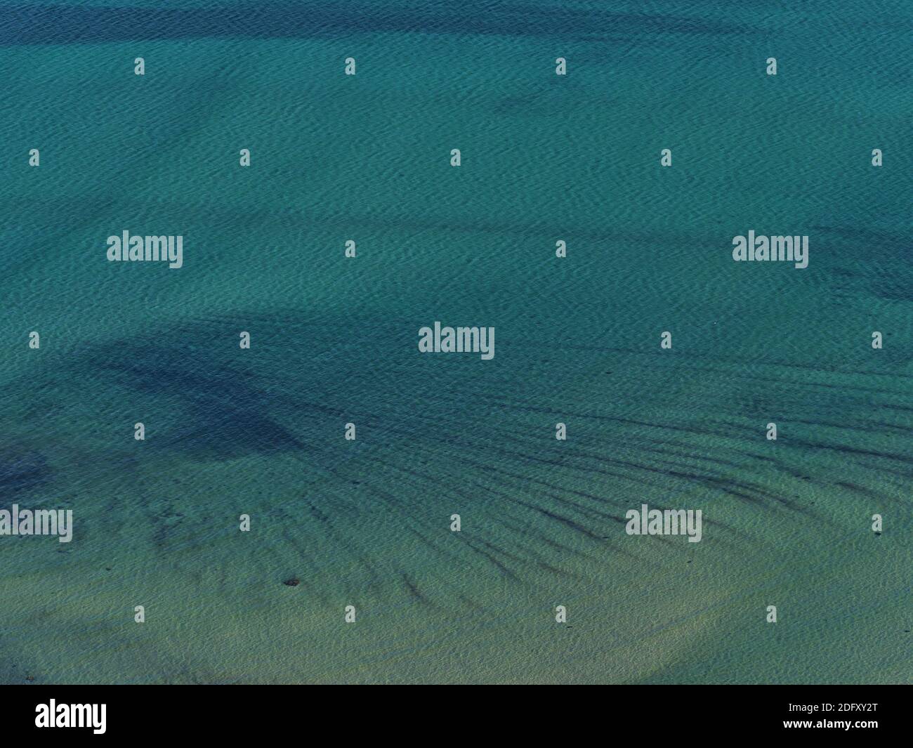 Beautiful aerial view of shallow textured water with turquoise and blue ...