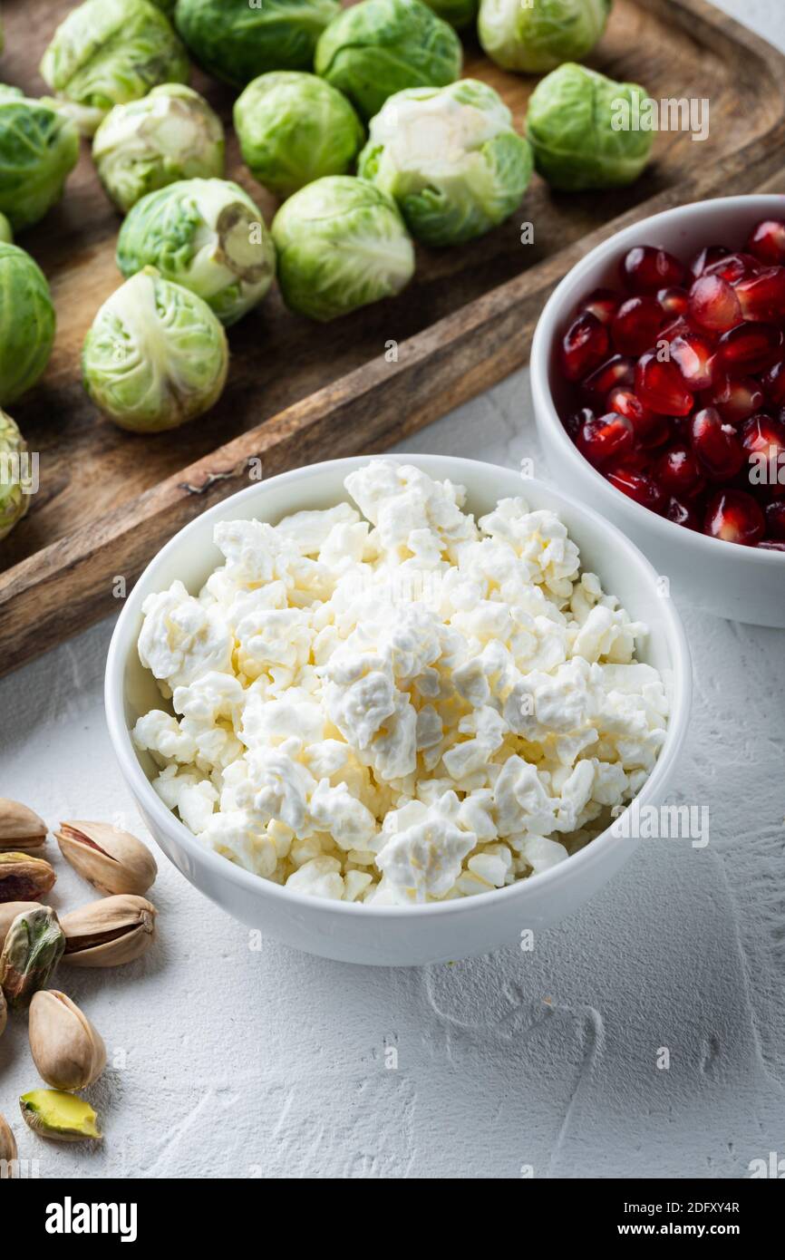 Cottage cheese, curd, on white textured background Stock Photo - Alamy
