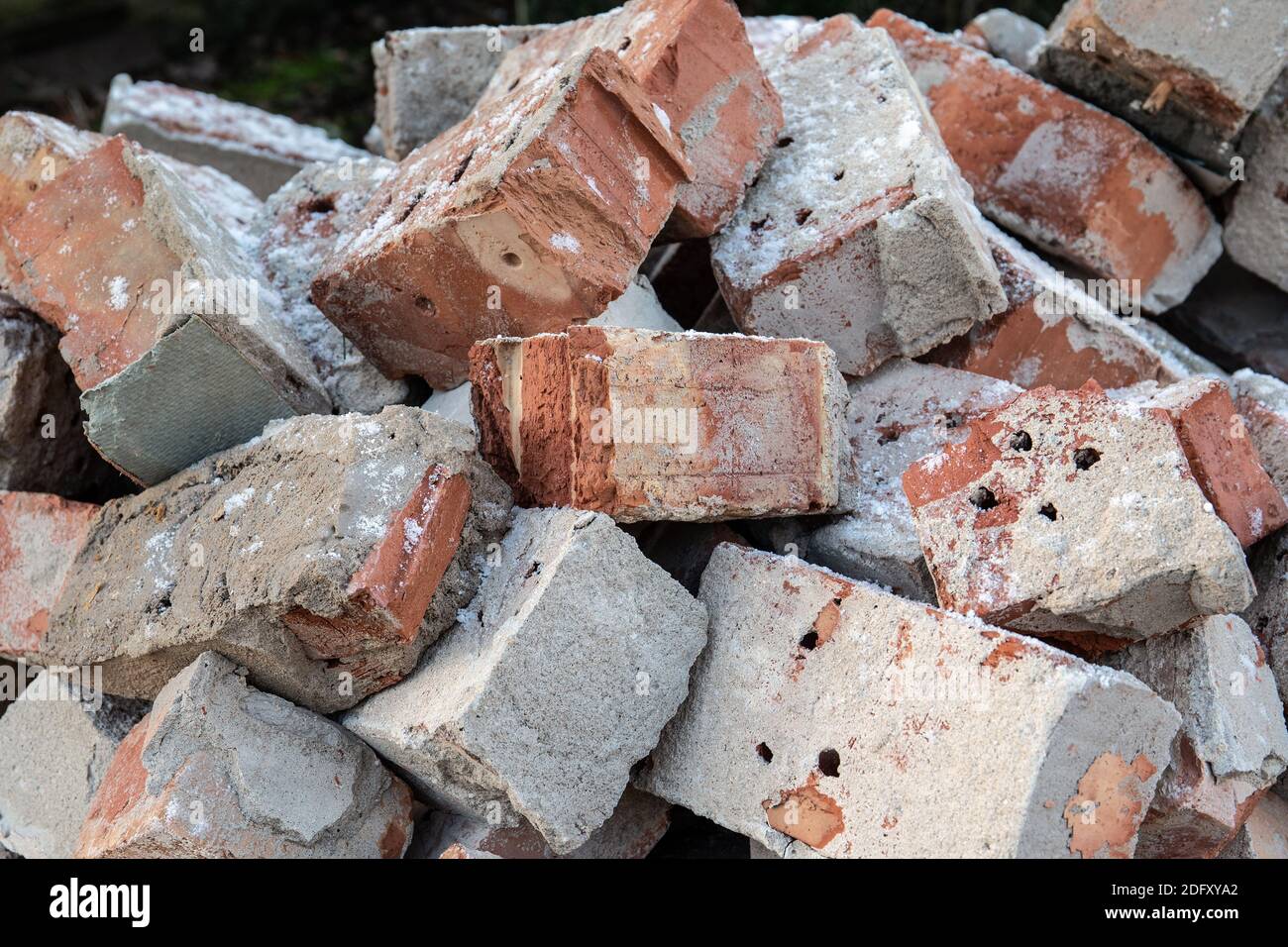 Red brick stack. Old, used building material. Waste recycling and ...