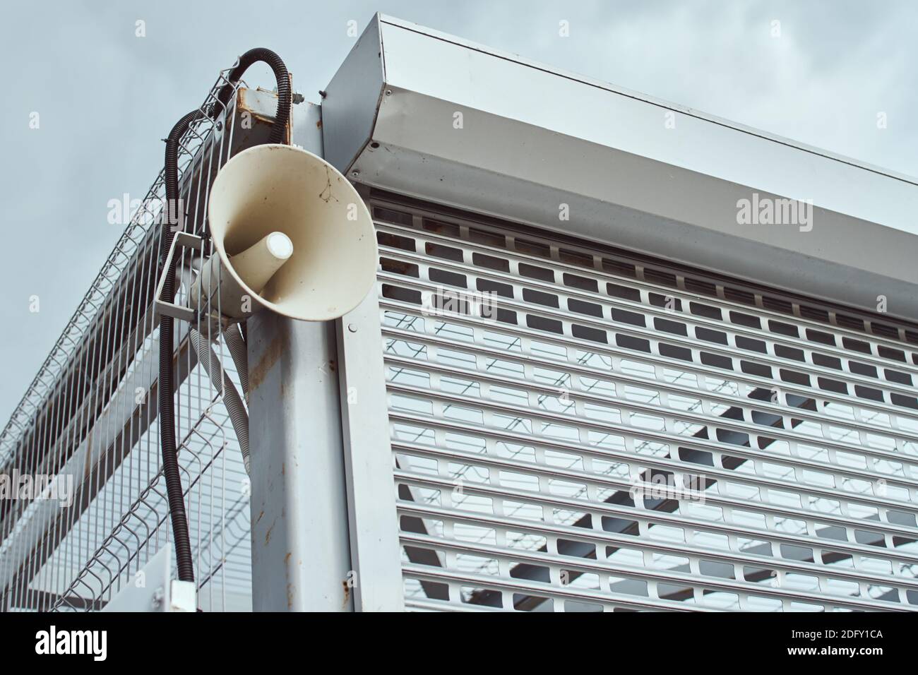 Public megaphone on building construction. Speaker for announcing ...