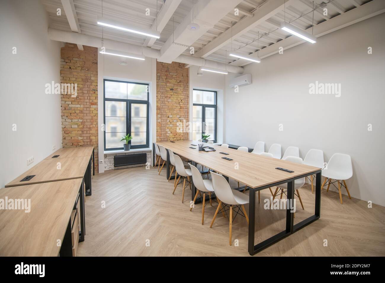 Picture of a meeting room with a long table Stock Photo - Alamy