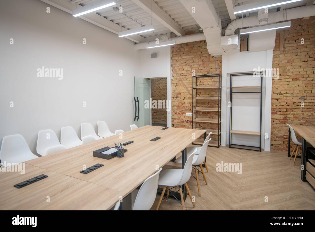 Picture of a meeting room with a long table Stock Photo - Alamy