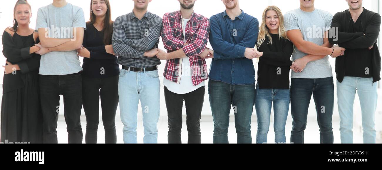 group of happy young employees standing together Stock Photo - Alamy