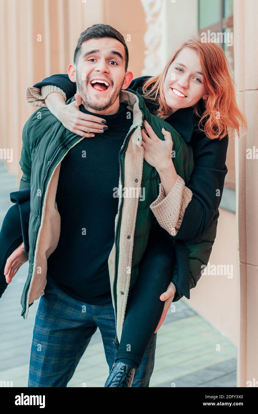 Cheerful Young Couple Hanging on the Street. Two Happy Loving People ...