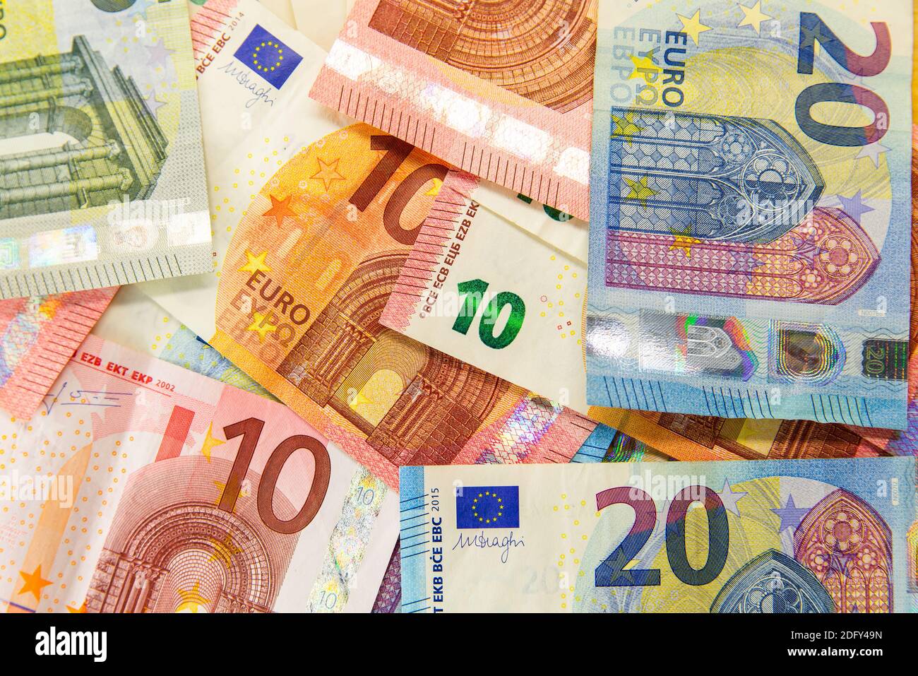 Pile of euro banknotes as background. Money concept Stock Photo - Alamy