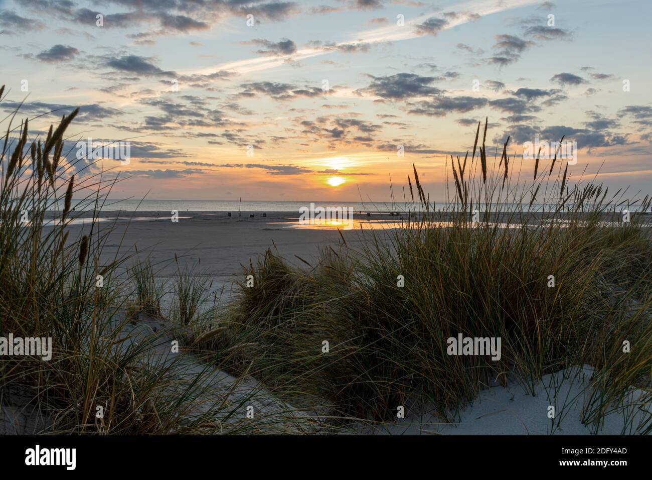 Setting sun on Amrum, Germany Stock Photo - Alamy