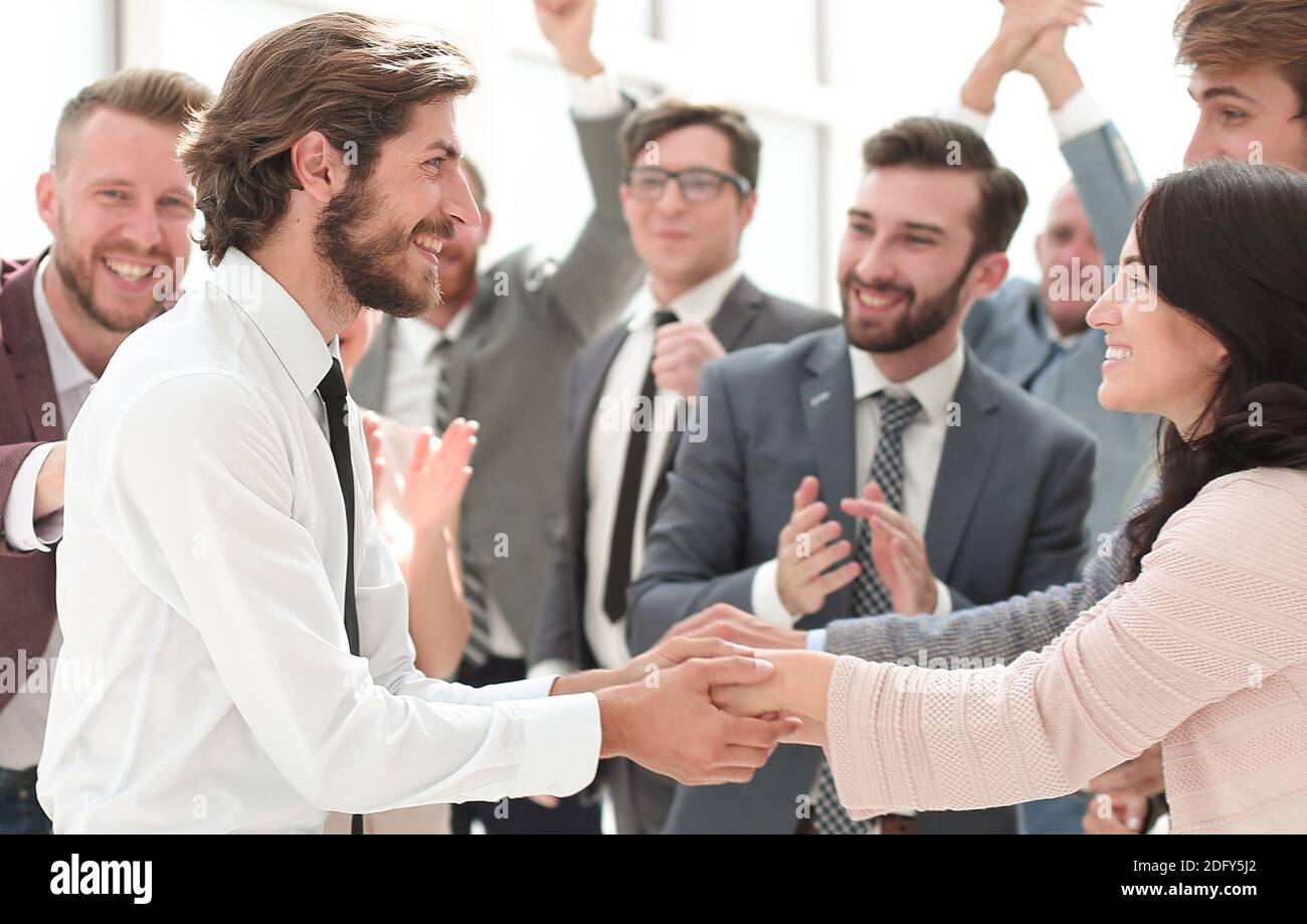 Team congratulating hi-res stock photography and images - Alamy