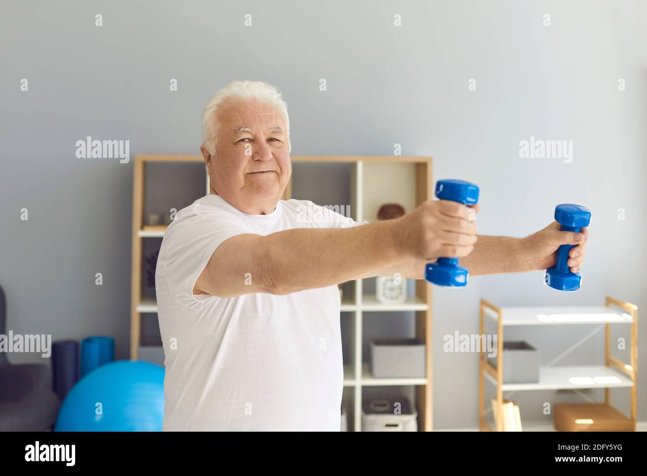 Happy senior man leading healthy lifestyle and exercising with ...