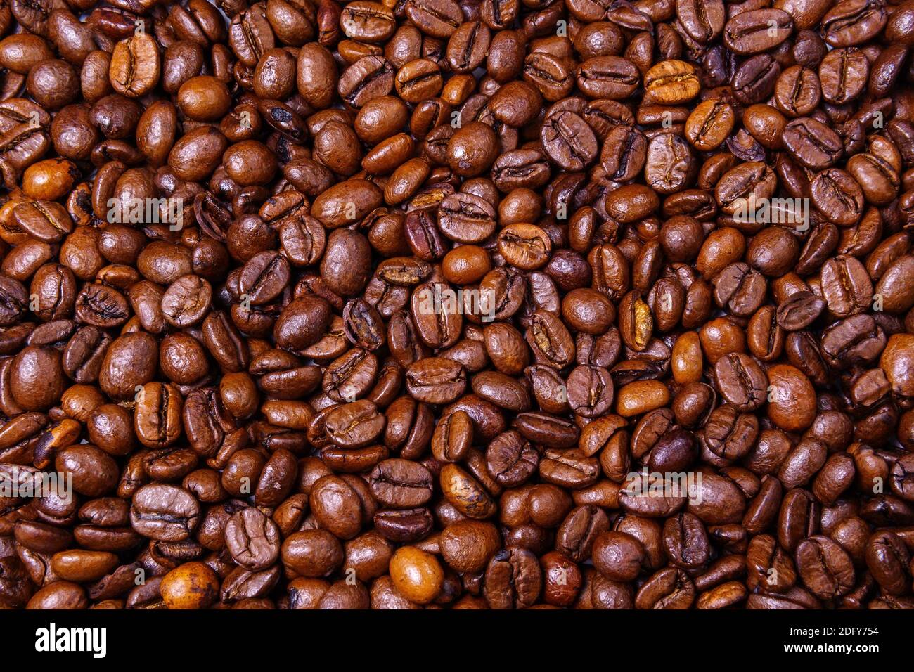 roasted coffee beans background texture top view Stock Photo - Alamy