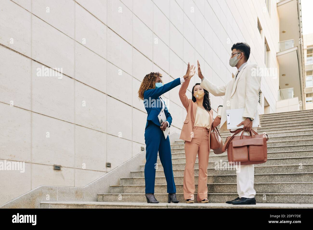 Celebrating sucessful project completion Stock Photo - Alamy