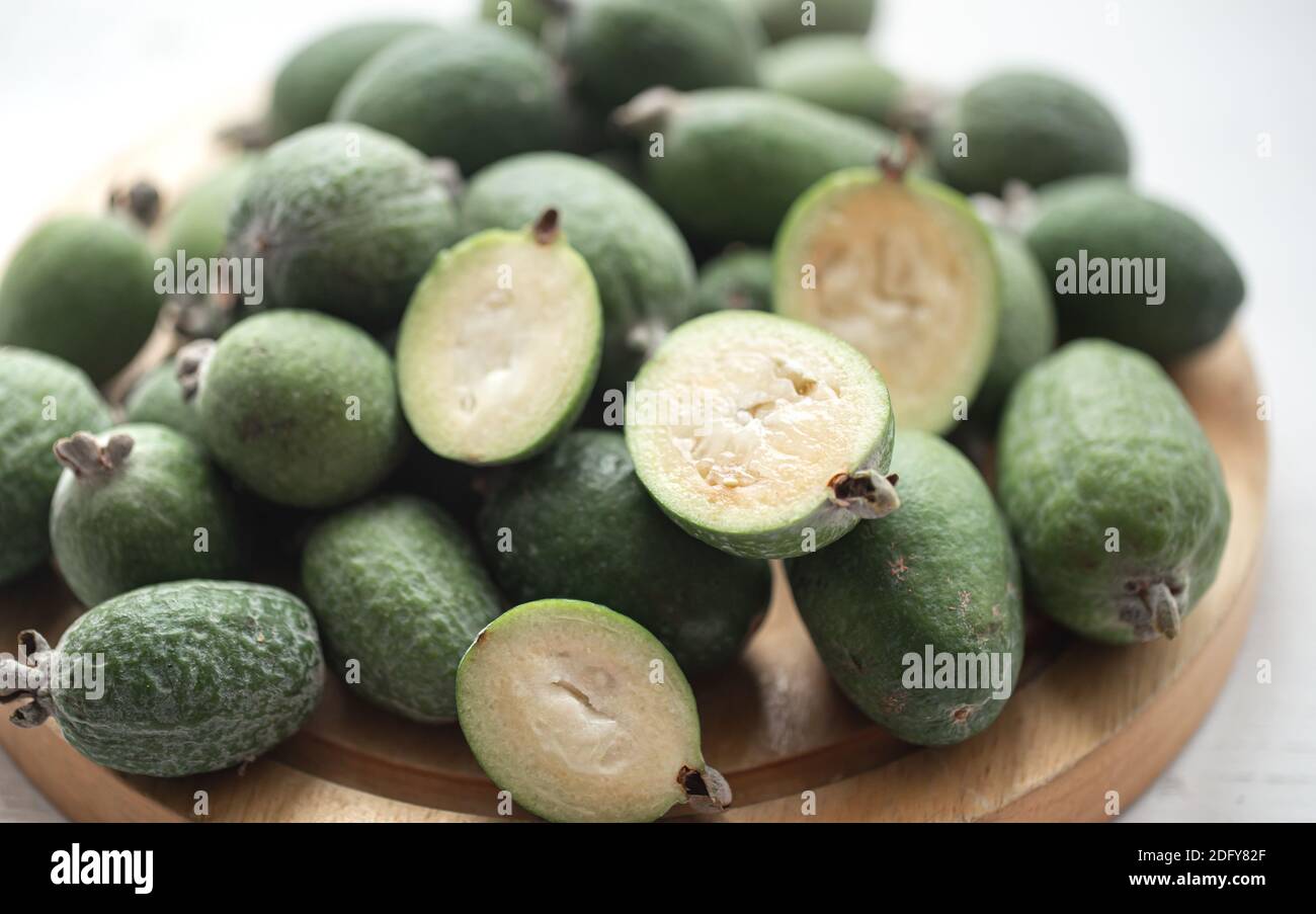 Feijoa green on a light background. Feijoa Selloana is a fruit crop ...