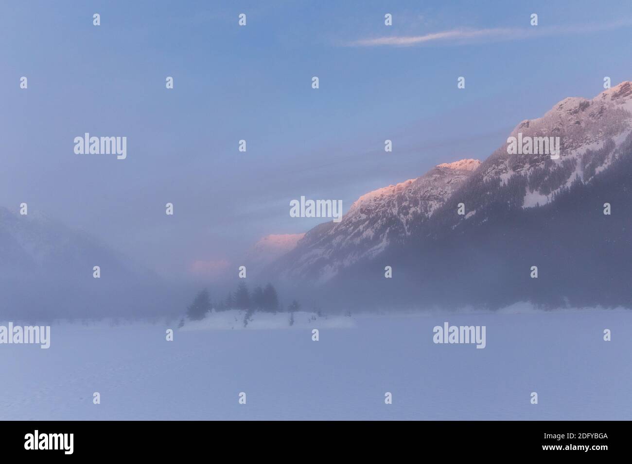 The blue hour captured at frozen Gold Creek Pond in Washington Stock ...