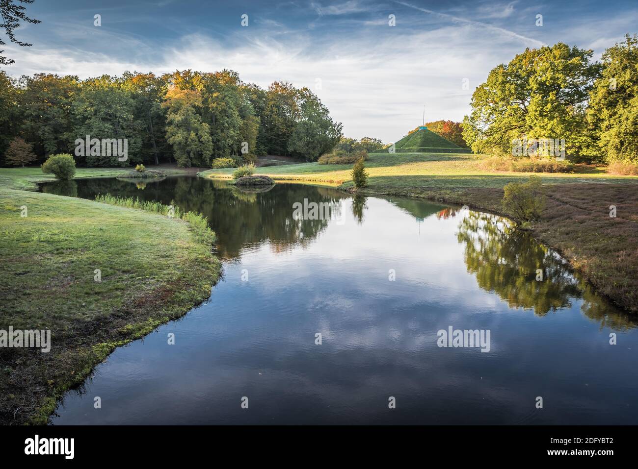 The land pyramid is reflected in the water Stock Photo - Alamy