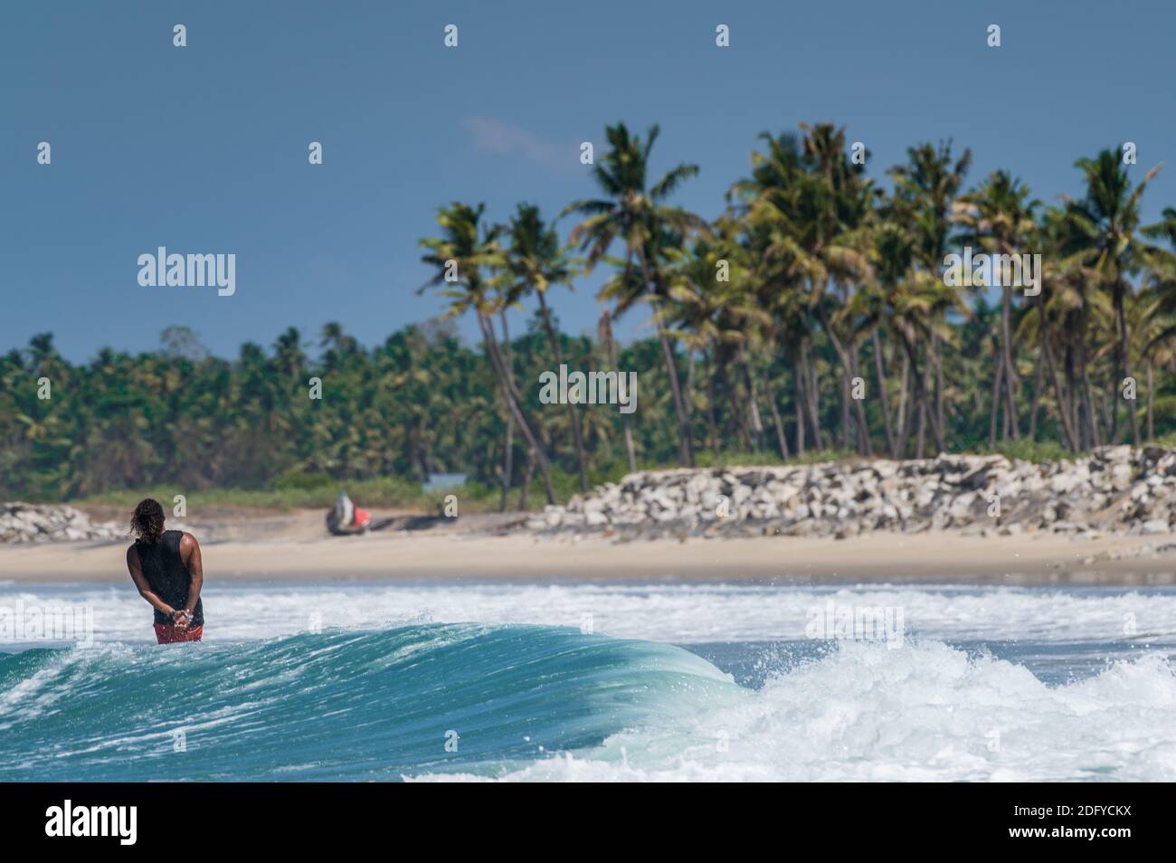 VARKALA, INDIA - Mar 14, 2020: An Indian Male Surfing in Style with his ...