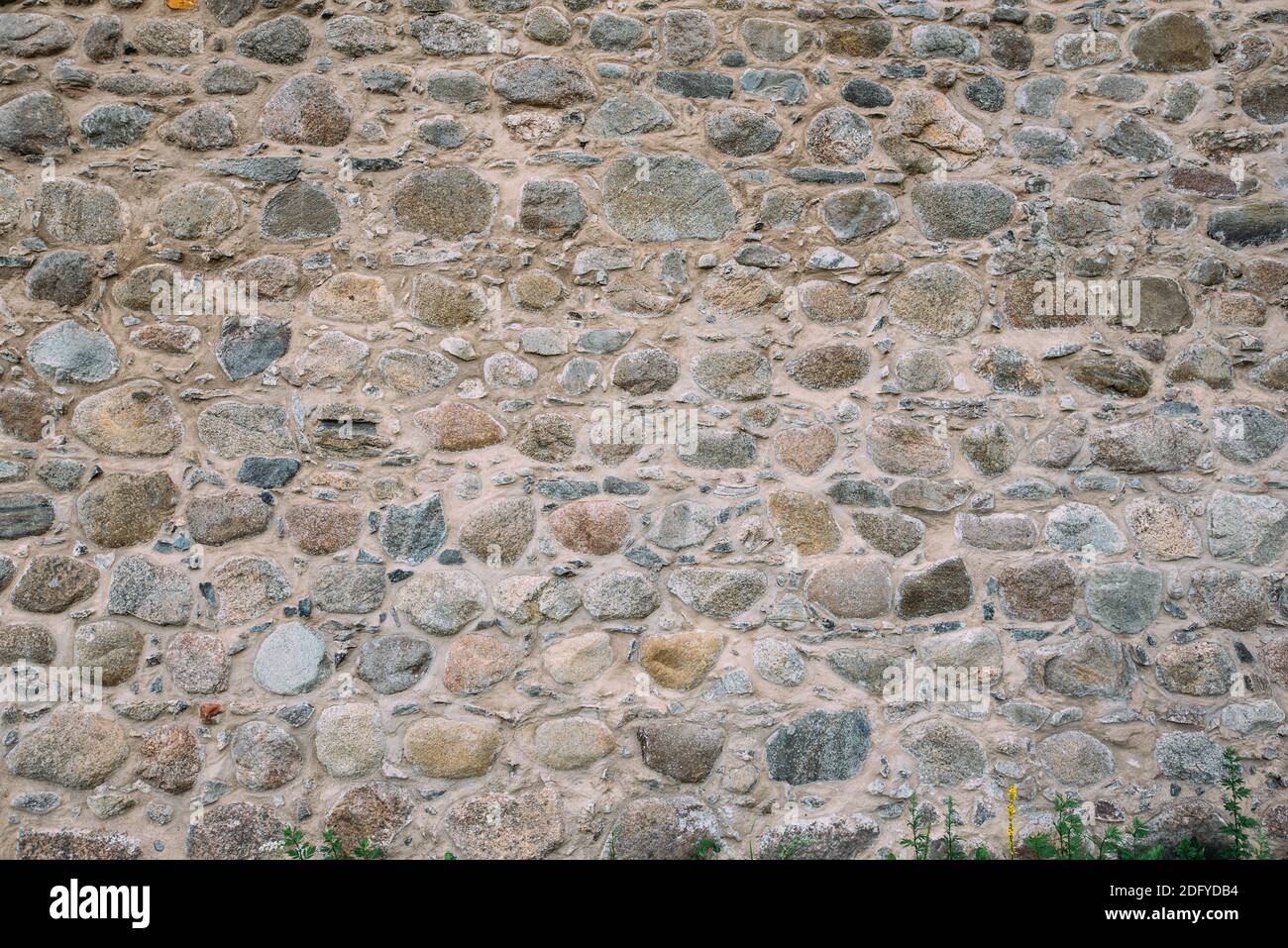 high castle wall made of large stone Stock Photo - Alamy