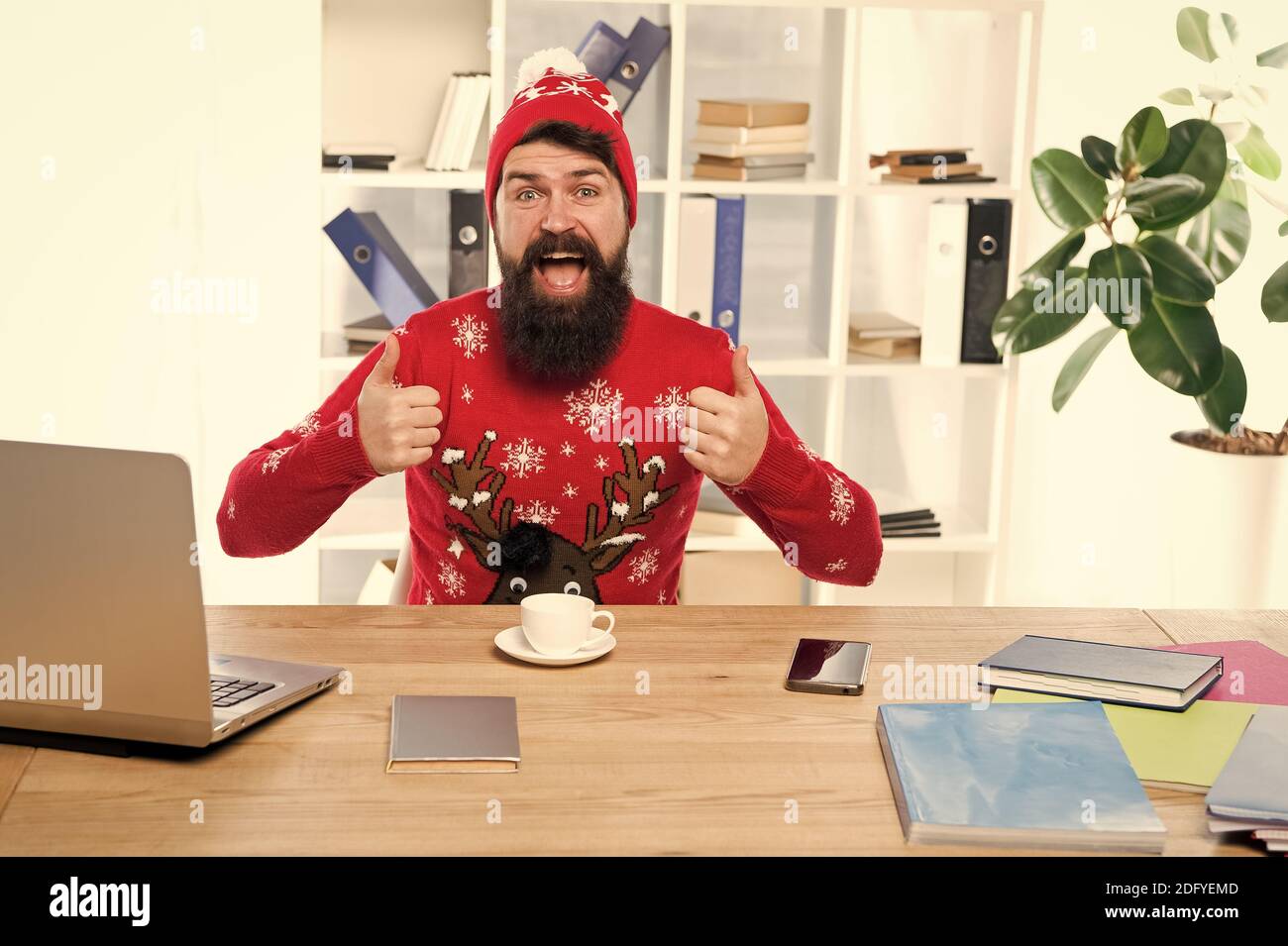 Thumbs up and keep out the cold. Happy hipster give thumbs ups in ...