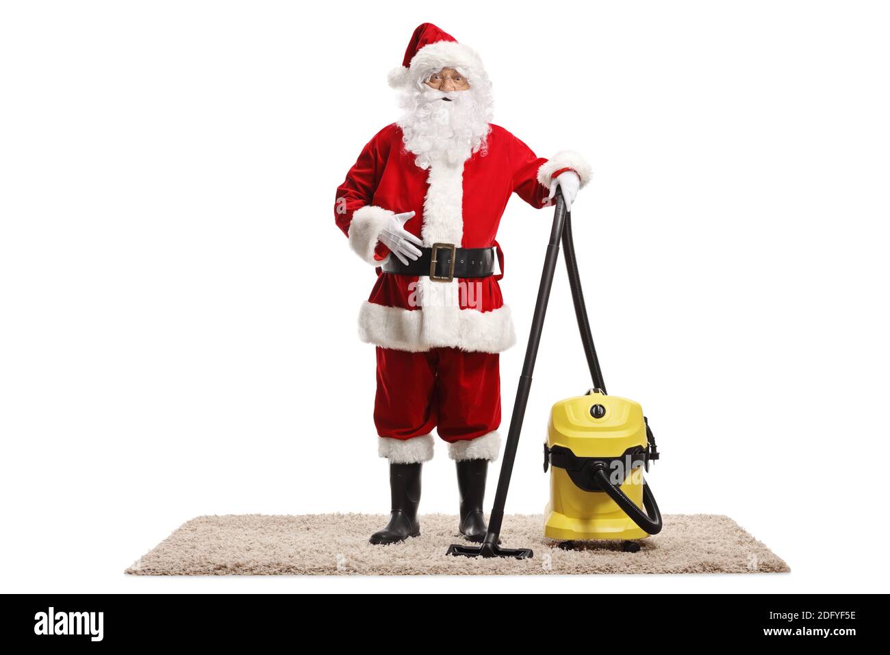 Full length portrait of santa claus with a vacuum cleaner isolated on ...