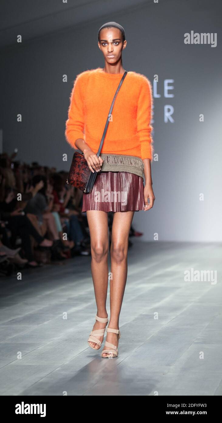 Model walking down runway, The Outnet show, 'Jungle Fever' collection ...