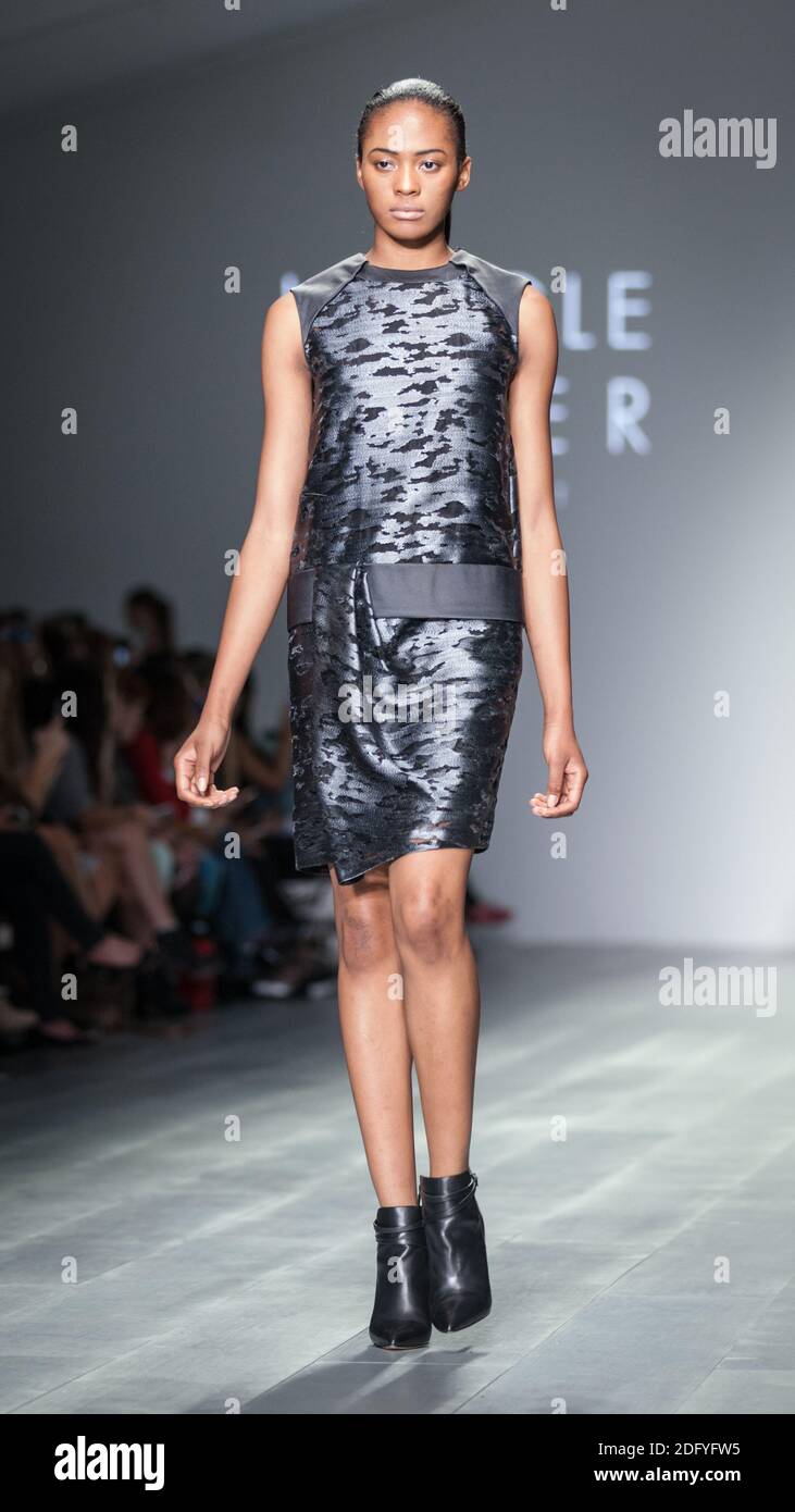 Model walking down runway, The Outnet show, 'Jungle Fever' collection ...