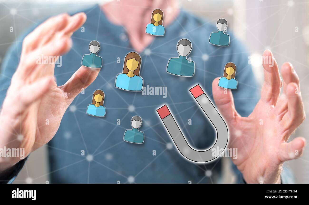Hiring concept between hands of a man in background Stock Photo - Alamy
