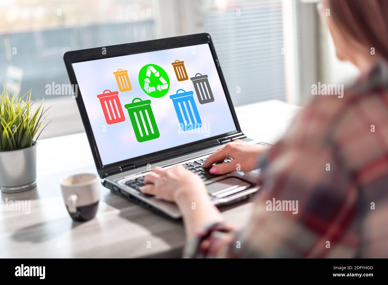 Laptop screen displaying a recycling concept Stock Photo - Alamy