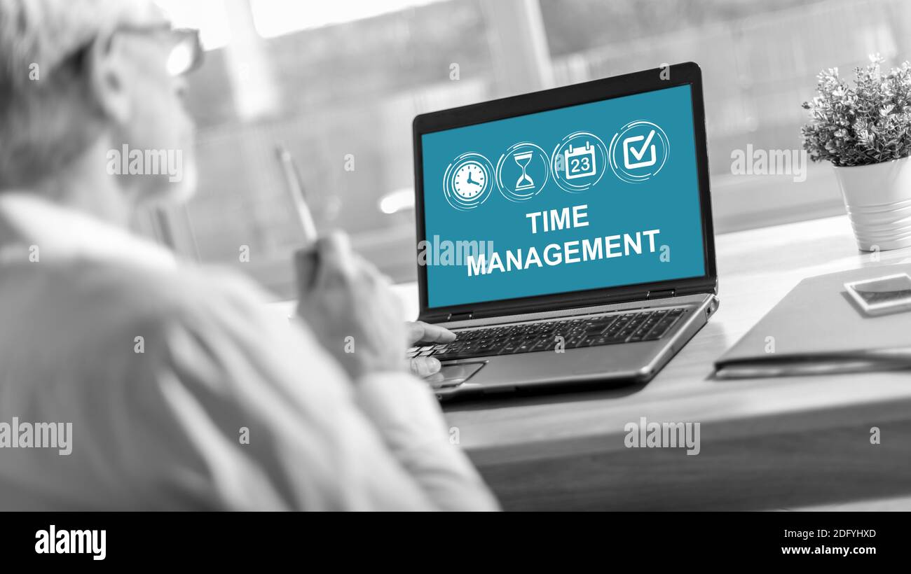 Laptop screen displaying a time management concept Stock Photo - Alamy
