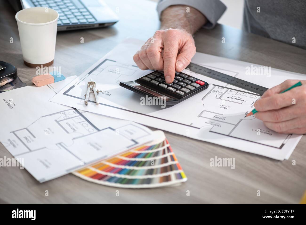 Architect calculator using plan project hi-res stock photography and ...