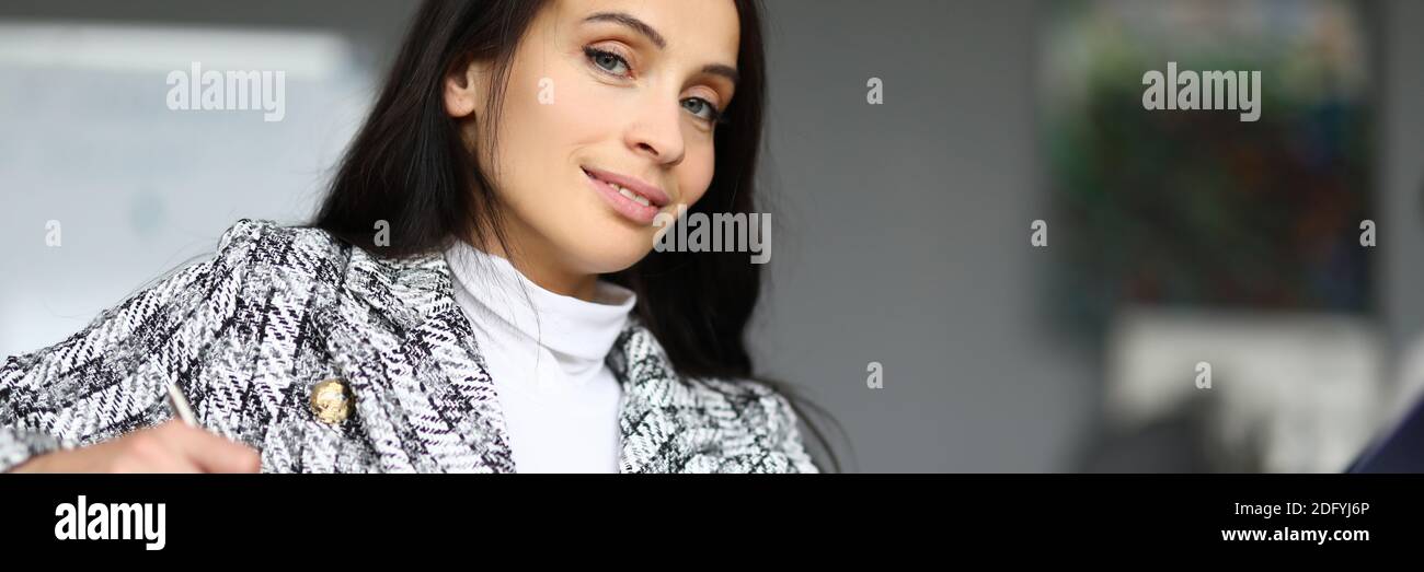 Beautiful office lady holding hi-res stock photography and images - Alamy