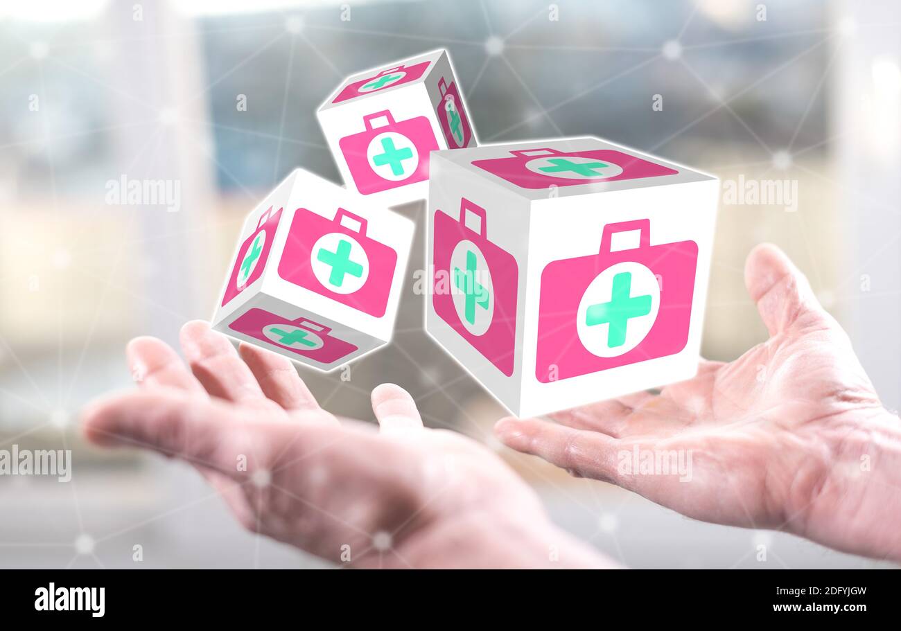 First aid concept above the hands of a man Stock Photo - Alamy