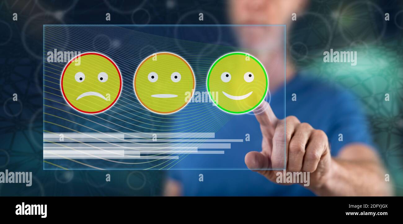 Man touching a customer satisfaction concept on a touch screen with his ...