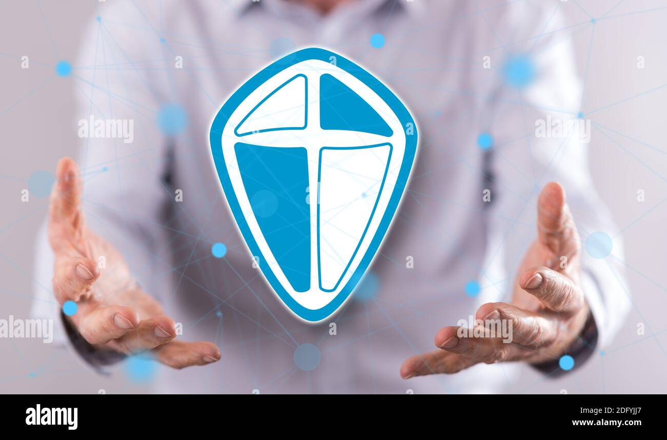 Protection concept above the hands of a man in background Stock Photo ...