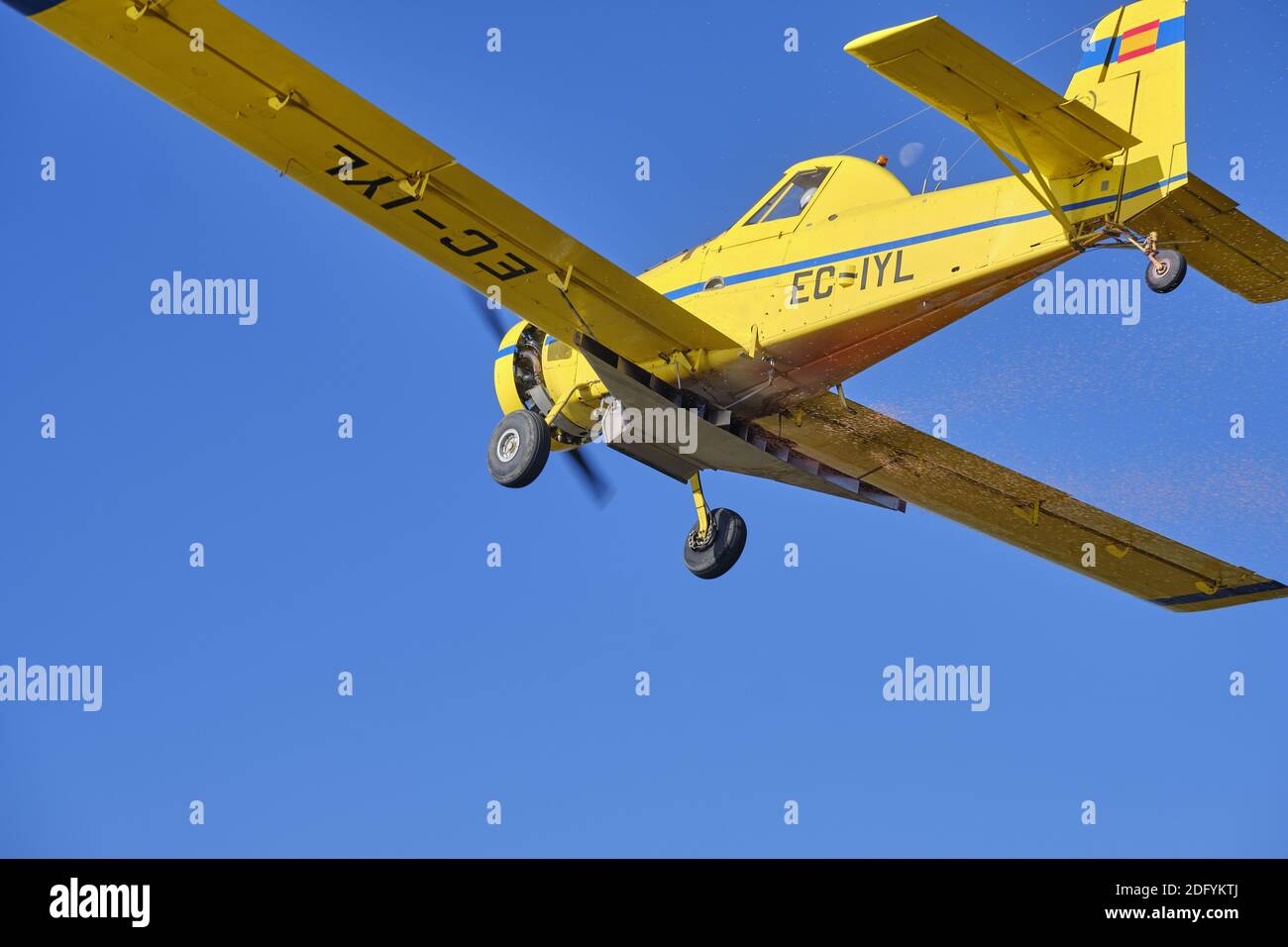 Vintage single-engine aircraft form field cultivation with a propeller ...