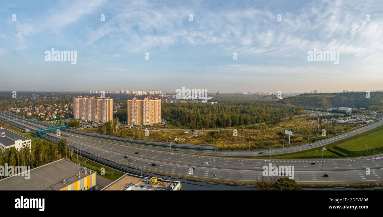 Outskirts of Moscow. Panorama of a wide highway in an industrial area ...