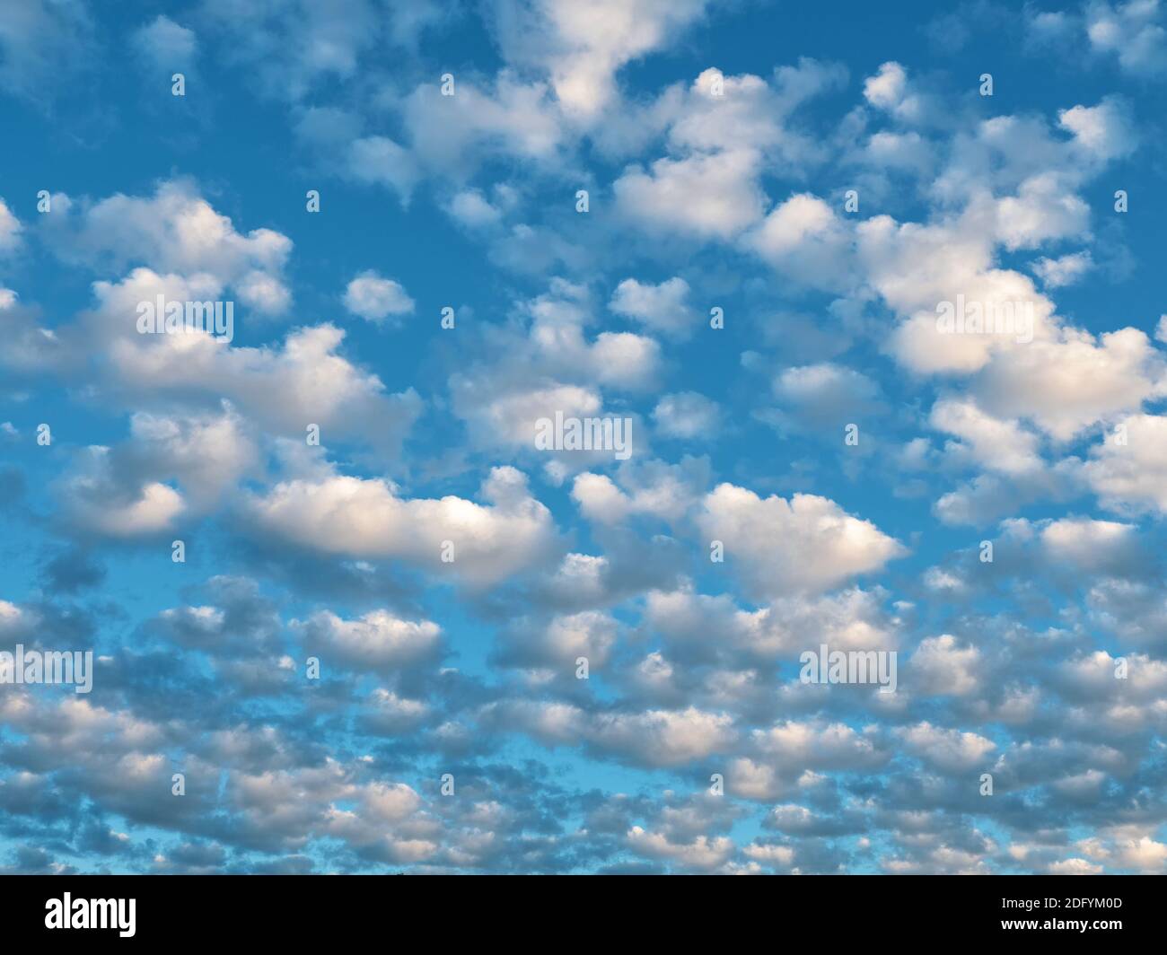 Blue sky lots small clouds hi-res stock photography and images - Alamy