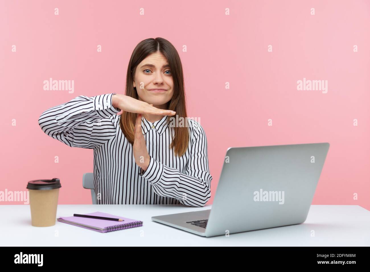 Exhausted overworked woman showing time out gesture, asking for break ...