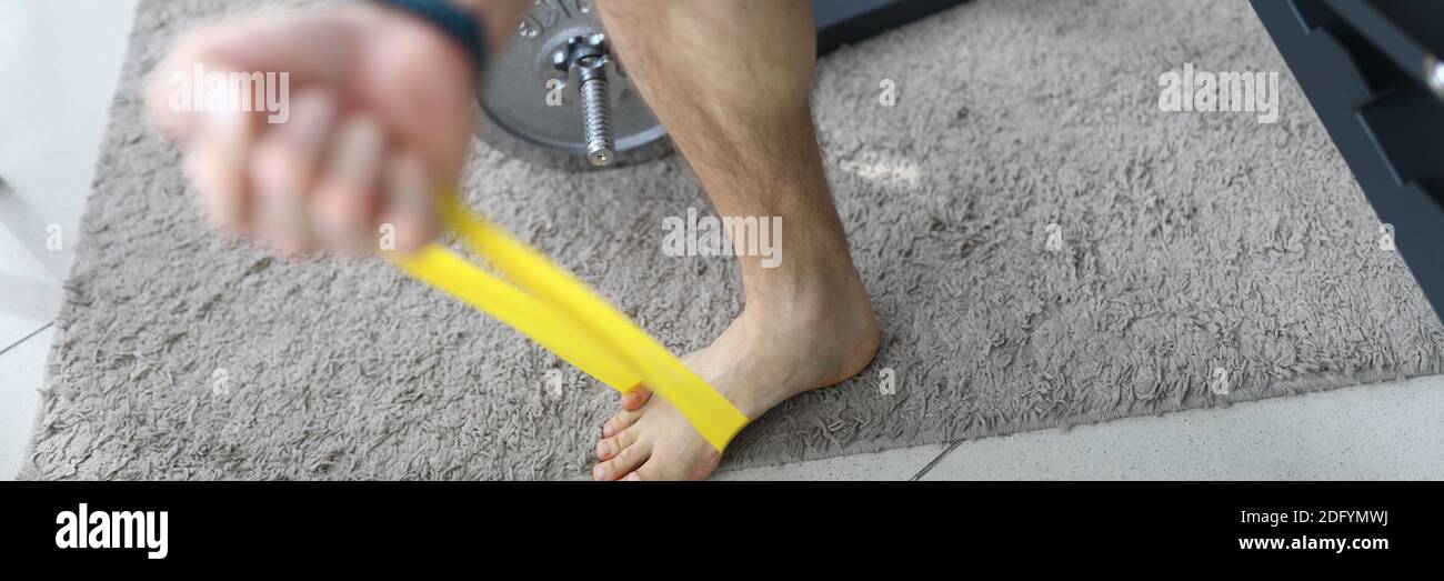 Strong hand clenched in fist Stock Photo - Alamy