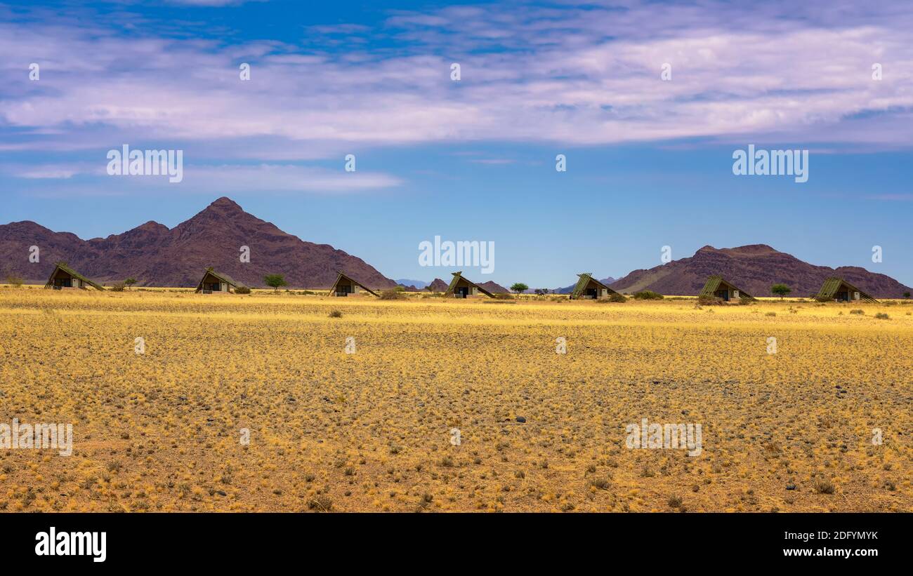 Small cabins of a desert lodge near Sossusvlei in Namibia Stock Photo ...