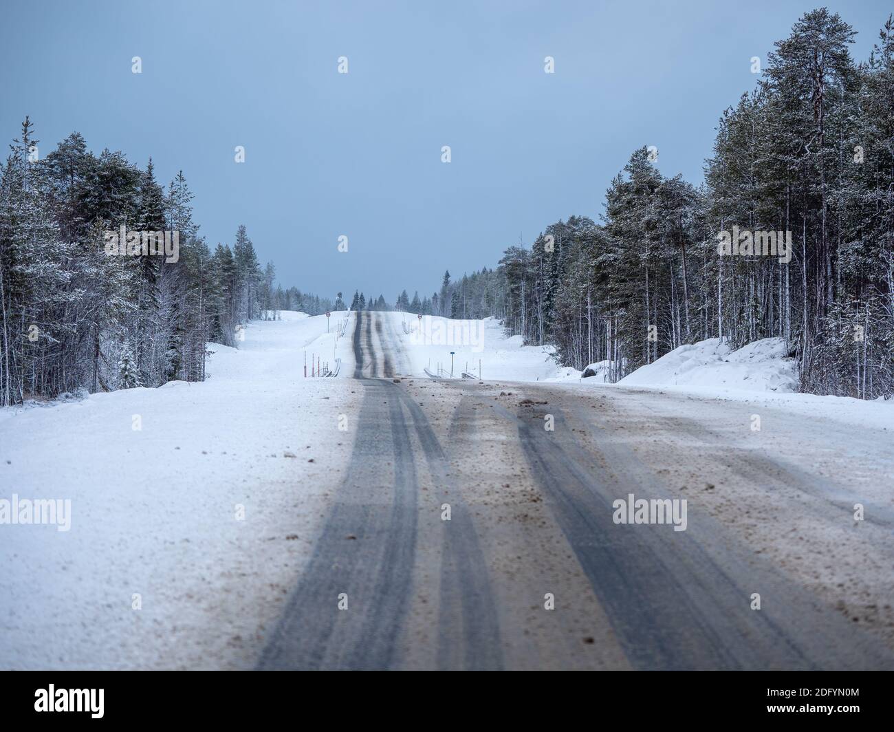 Arctic snow straight winter road through the hills Stock Photo - Alamy