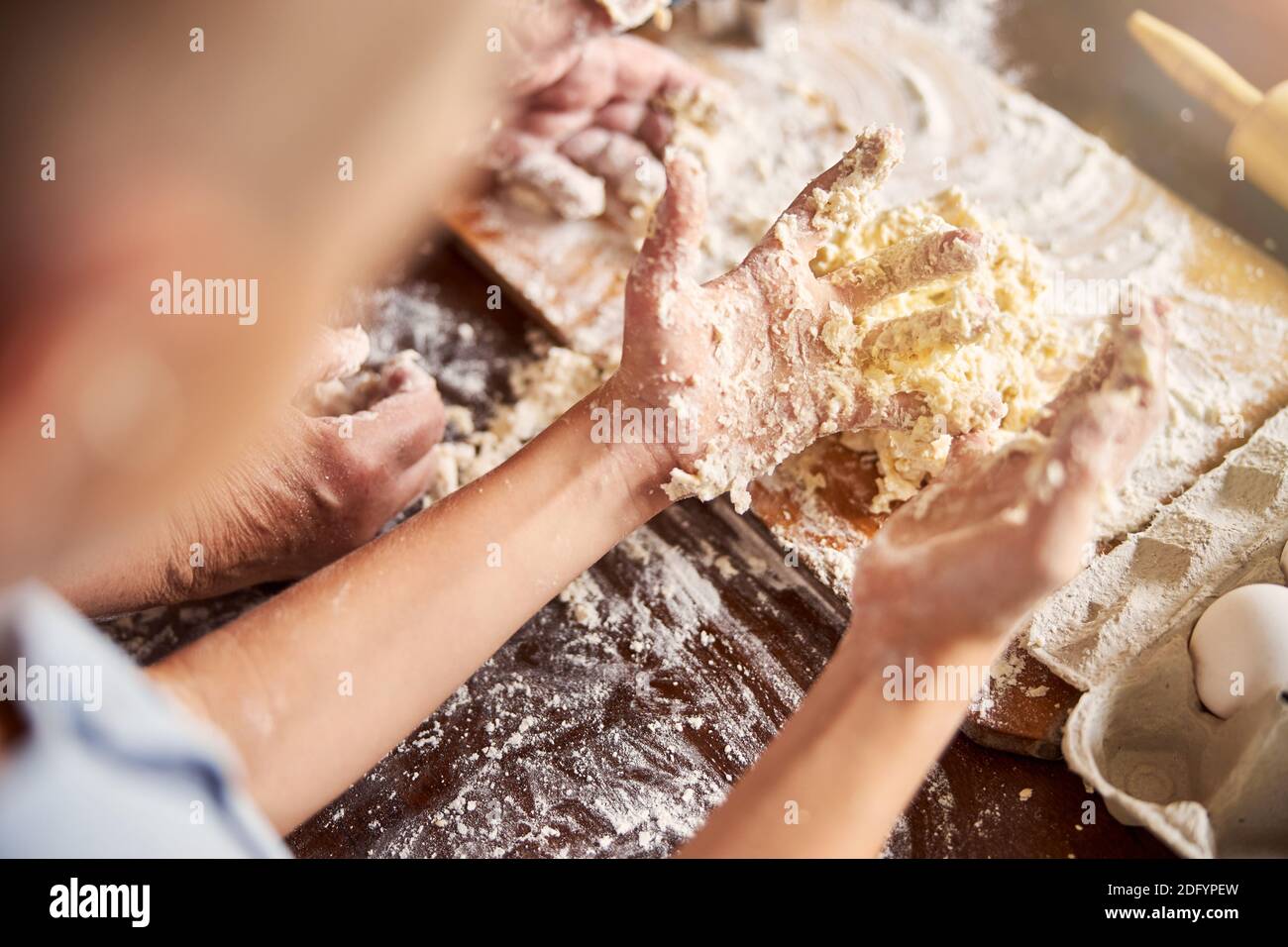 Little chef hands covered in baking mixture Stock Photo - Alamy