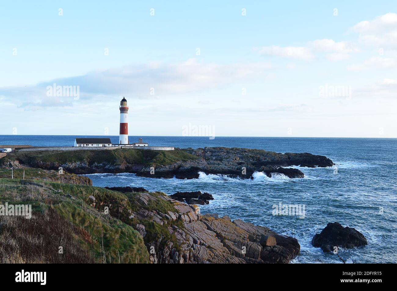 The Buchan Ness lighthouse at Boddam, Aberdeenshire, Scotland. once a ...
