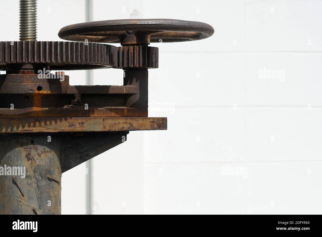 Close-Up a veiw of a big drive gear for a hand turn manual Close-Open ...