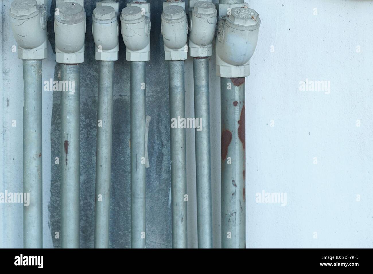A steel pipe for wiring cable out of building Stock Photo - Alamy
