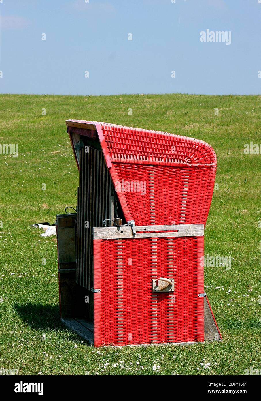 Red wicker beach chair Stock Photo - Alamy