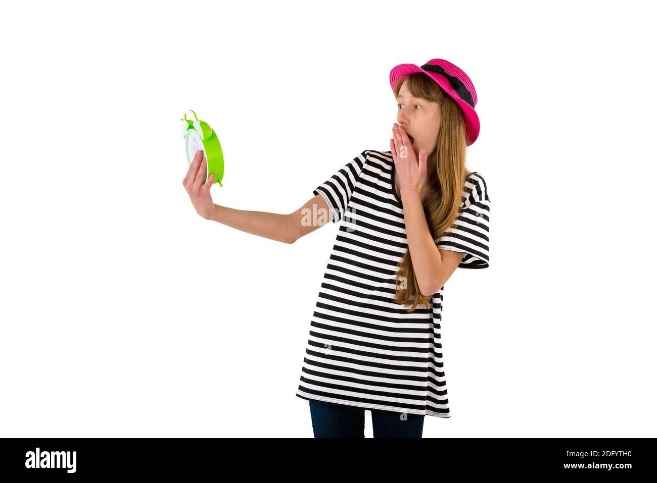 Shocked Girl look at alarm Clock, isolated on white background ...