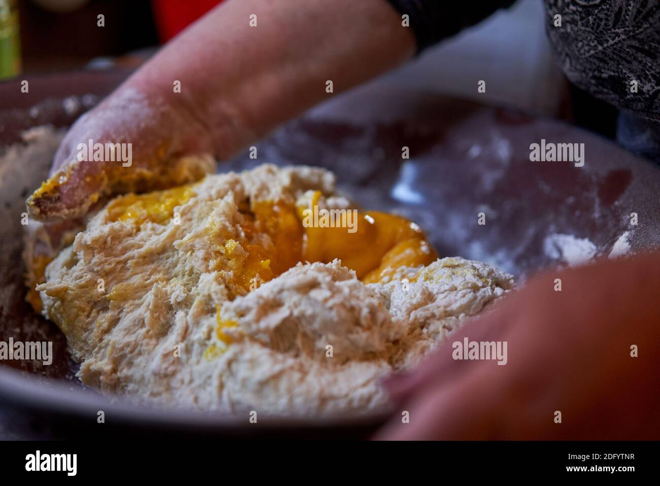Anonymous chef making and kneading a cake dough Stock Photo - Alamy