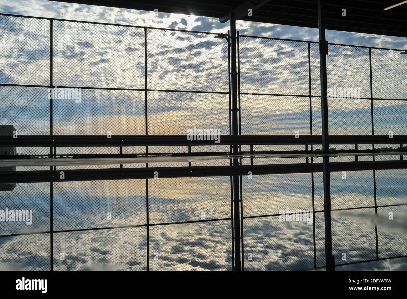 Car Park reflection in a puddle of water after the rain Stock Photo - Alamy