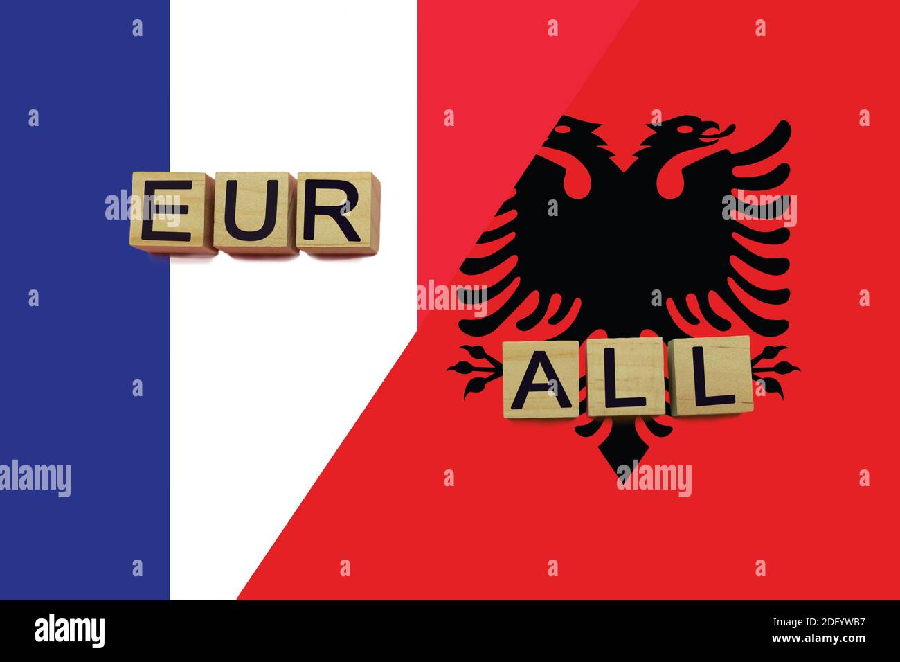 France and Albania currencies codes on national flags background ...